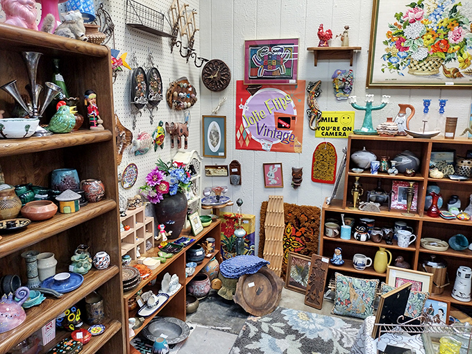 America's Antique Mall announces itself with patriotic flair, its red exterior and white stars promising a star-spangled journey through America's collective attic.