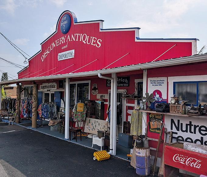 The bold red fa&ccedil;ade of Discovery Antiques rises like a beacon for treasure seekers, hinting at journeys through time rather than just another shopping trip.