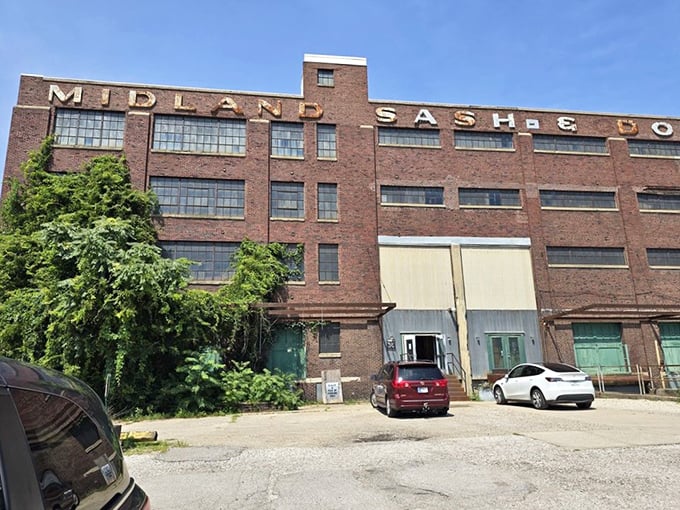 The imposing brick facade of Midland Arts & Antiques Market stands like a time machine disguised as architecture, promising treasures within its historic walls.