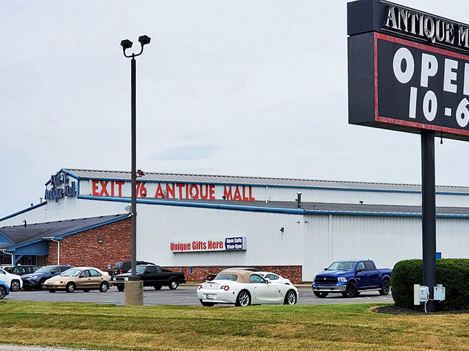 The iconic blue-trimmed exterior and bold signage promise what lies within&mdash;a labyrinth of memories where time stands still but parking doesn't.