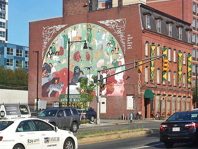 The iconic brick exterior of Cambridge Antique Market, where that eye-catching mural practically screams "treasures inside!" to passing traffic.