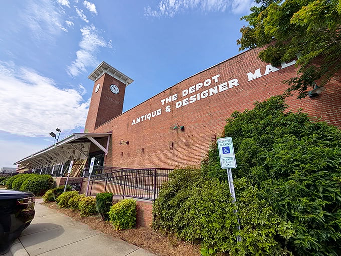 The iconic brick exterior with its towering clock tower stands as a beacon for treasure hunters. History and possibility await behind those walls.