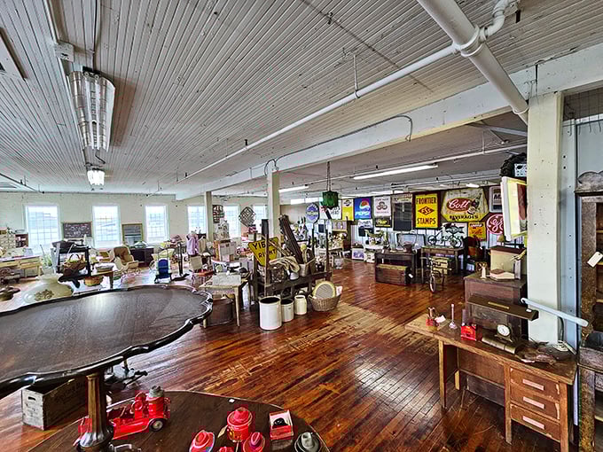 Step inside and the industrial bones of the building reveal themselves. High ceilings, original wood floors, and enough antiques to make a museum curator jealous.