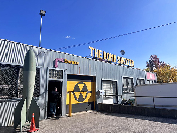 The corrugated metal exterior with its bold yellow entrance door and nuclear symbol promises a blast from the past inside this Akron treasure trove.