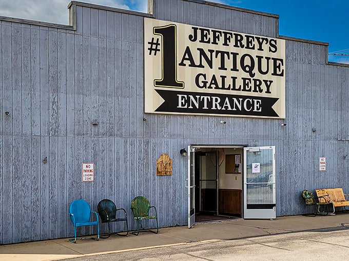 The unassuming gray exterior of Jeffrey's Antique Gallery hides a universe of treasures within, like a time-travel portal disguised as a warehouse.