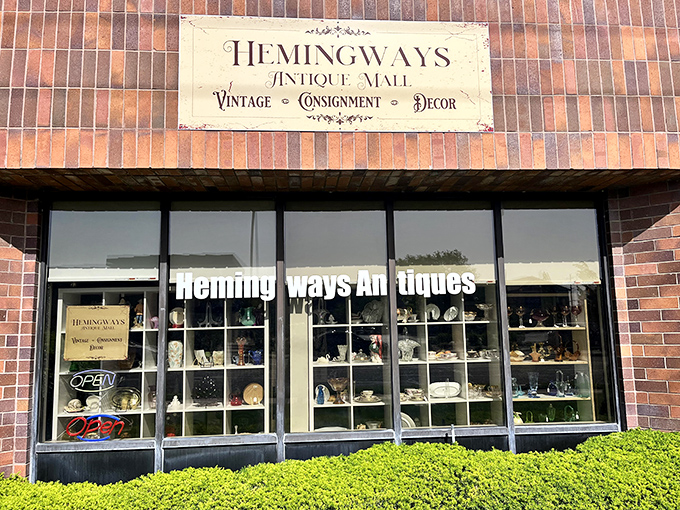 The elegant sign promises "Vintage • Consignment • Decor" – three magic words that translate to "goodbye, savings account."