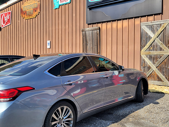 The unassuming exterior hides a treasure trove within, where vintage finds and quirky d&eacute;cor wait to surprise you. Adventure awaits behind those barn-style doors!