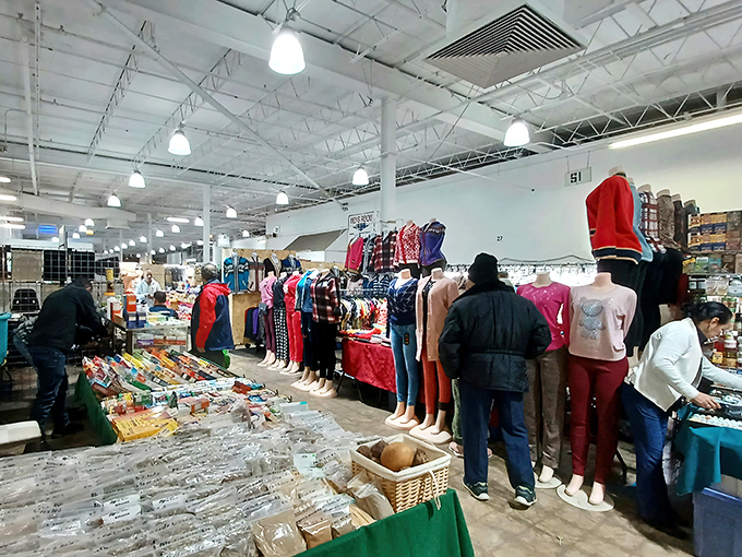 The red and white striped exterior of Swap-O-Rama stands like a circus tent of commerce, promising treasures within for the intrepid bargain hunter.
