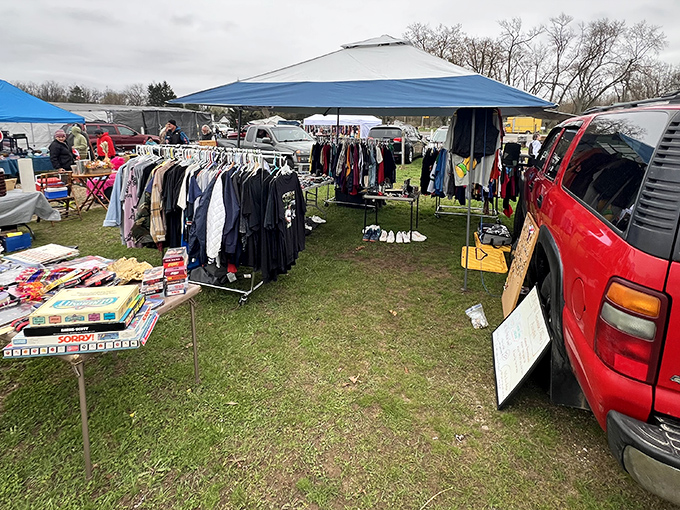 Where one person's "I don't need this anymore" becomes another's "I've been looking everywhere for this!" The treasure hunt begins under blue canopies.