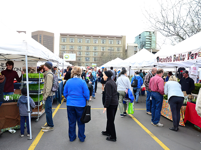 A sea of white tents transforms an ordinary parking lot into Boise's weekend food paradise. Even stormy skies can't dampen the market's vibrant energy. 