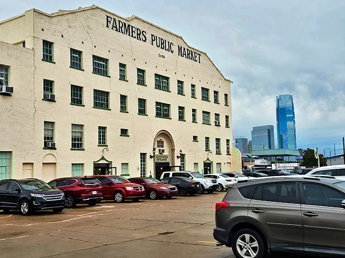 The Spanish Colonial Revival fa&ccedil;ade of OKC Farmers Public Market stands as a timeless sentinel, welcoming visitors with architectural grace that whispers of Oklahoma's vibrant past.