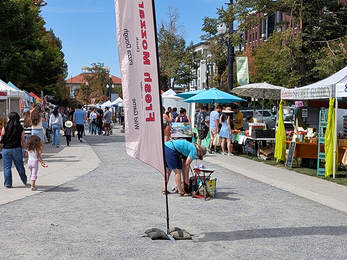 White tents line the pathways of Pioneer Park, creating a village of culinary treasures and artisanal delights that transforms Saturday mornings into weekend adventures.