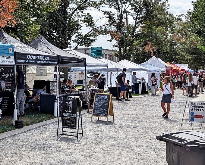 White tents line the pathways of Pioneer Park, creating a village of culinary treasures and artisanal delights that transforms Saturday mornings into weekend adventures.