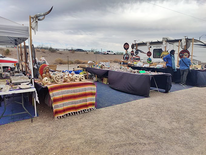 Outdoor vendor stalls stretch endlessly, proving that one person's "I'll never wear this again" is another's vintage gold.