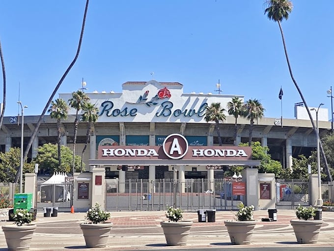 The iconic Rose Bowl Stadium transforms once a month from sports arena to treasure hunter's paradise, where bargains await under those swaying California palms.