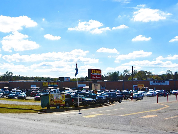 Under Carolina blue skies, Cooks Flea Market's sprawling exterior hints at the vast wonderland of deals waiting inside for weekend treasure hunters.