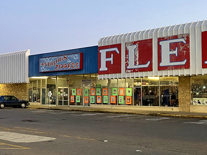 The iconic "FLEA" sign beckons treasure hunters like a Vegas marquee for the bargain-obsessed. Oklahoma's retail archaeology expedition begins here!