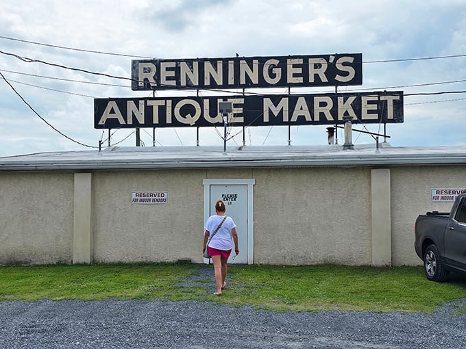 The unassuming entrance to treasure-hunting paradise. That weathered sign promises adventures in antiquing that no online shopping cart could ever deliver.
