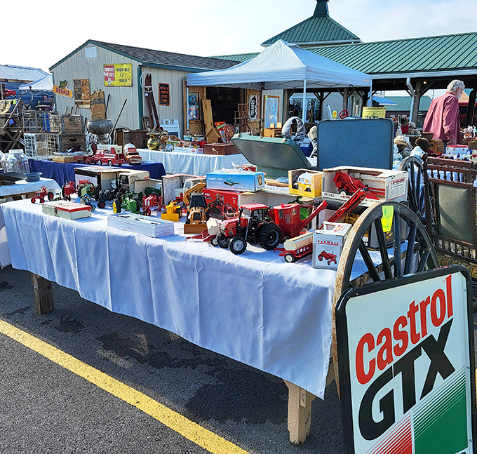 Vintage toy heaven! Model tractors, trucks, and collectibles await new homes at this treasure-filled table where childhood memories come with a side of nostalgia.