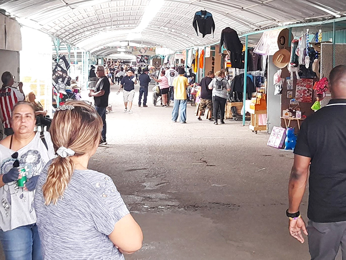 The covered walkways of Bronco Swap Meet stretch like an endless bazaar, where treasures and bargains await around every corner.