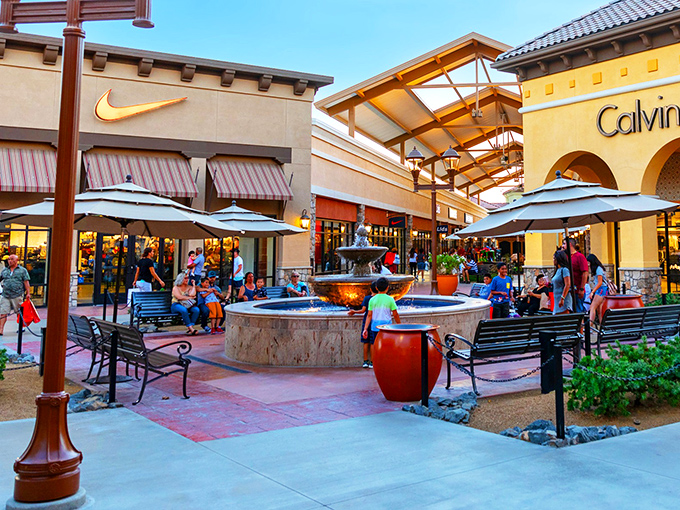 The Spanish-inspired architecture transforms bargain hunting into a resort experience. That fountain isn't just for show&mdash;it's where shopping companions rest their weary feet.