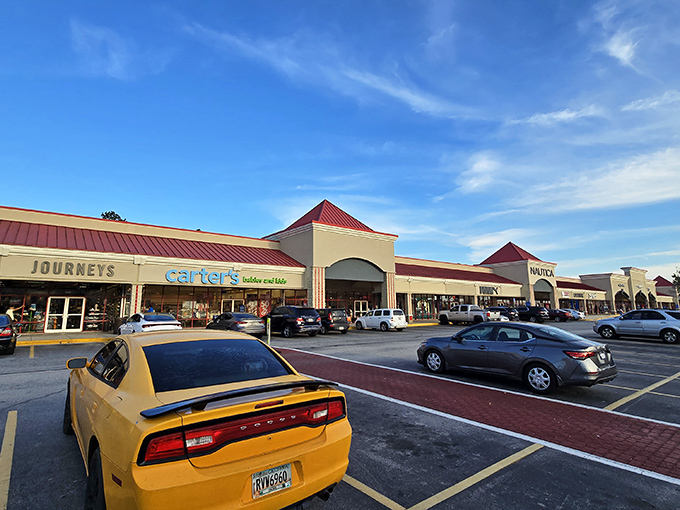 The retail promised land awaits under those iconic red roofs, where your credit card gets a workout and your closet gets an upgrade.