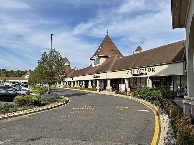 Those distinctive peaked roofs aren't just architectural flourish&mdash;they're landmarks guiding bargain hunters to their promised land of discounted retail therapy.