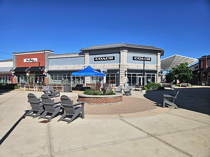 The Coach outlet beckons like a siren song of savings on this perfect Ohio shopping day.