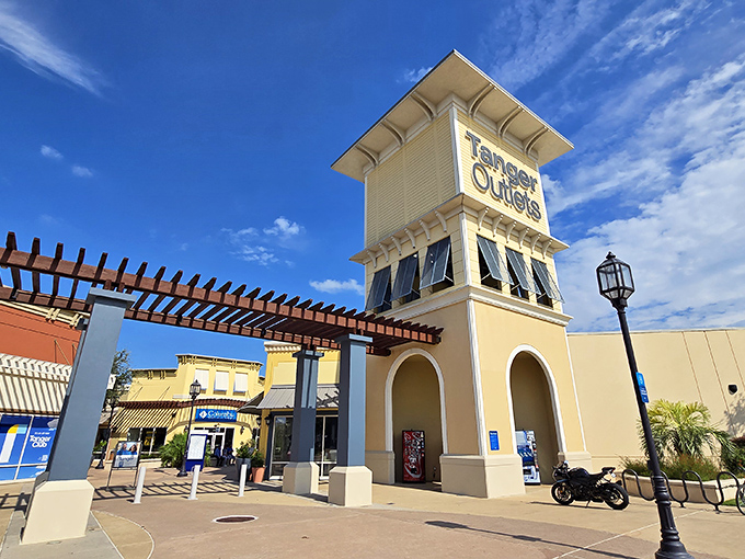 Mediterranean charm meets Texas-sized shopping dreams in this architectural marvel that welcomes bargain hunters with open arms.