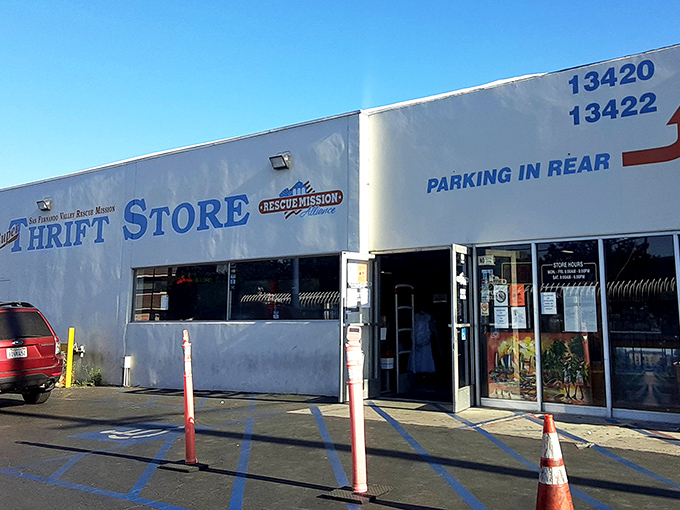 The unassuming exterior of Super Thrift Store beckons with its bold blue signage against white walls—like a blank canvas waiting for your bargain-hunting masterpiece.