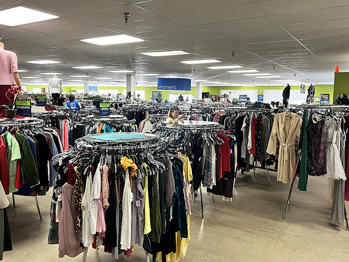 Treasure hunting paradise awaits at Lakewood's Goodwill, where circular racks create a labyrinth of fashion possibilities and unexpected finds.