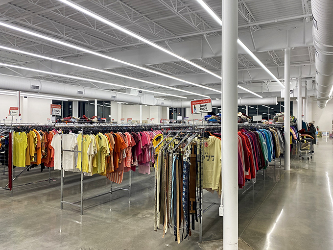 Endless racks stretch like a fashion runway where yesterday's trends become today's treasures at unbeatable prices.