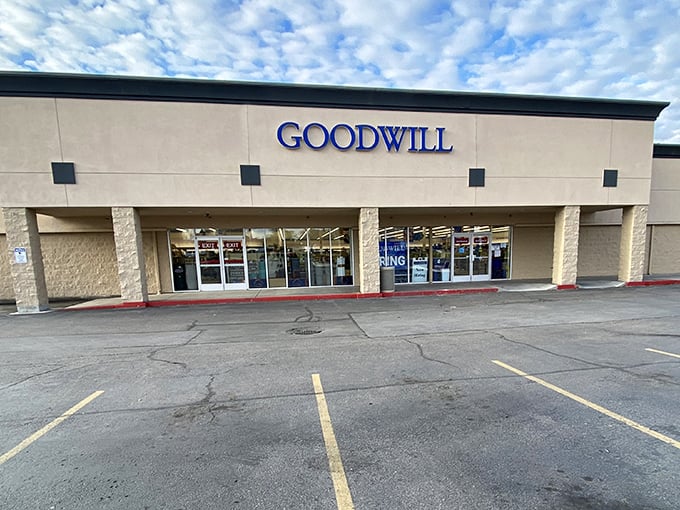 The unassuming exterior of Meridian's Goodwill belies the treasure trove within—like finding a five-star restaurant in a strip mall.