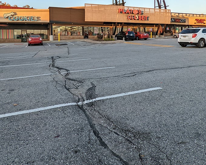 The iconic orange and blue Plato's Closet sign beckons bargain hunters like a fashion lighthouse in a sea of retail options.