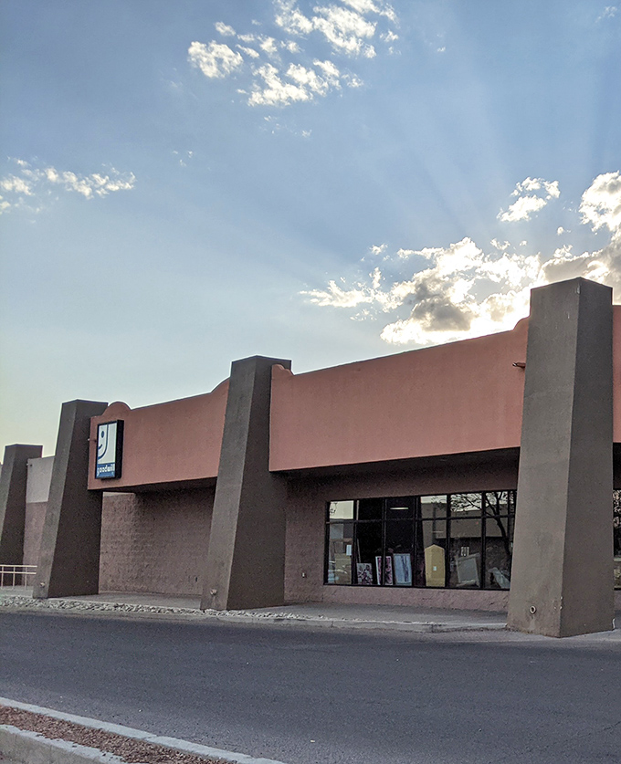 Desert sunlight plays across the distinctive southwestern architecture, where concrete pillars stand guard over secondhand gold.