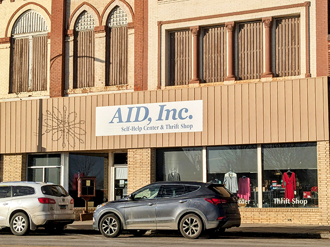 That classic brick facade with vintage architectural details houses the treasure trove you've been driving past forever.