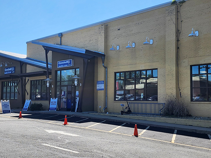 The sunshine-yellow exterior of Falls Church's Goodwill beckons like a beacon of bargain possibilities. Adventure awaits inside!