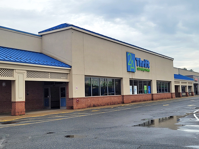 The blue-trimmed exterior of 2nd Ave Thrift Superstore stands like a beacon of bargain possibilities in Alexandria, where treasure hunting begins before you even step inside.