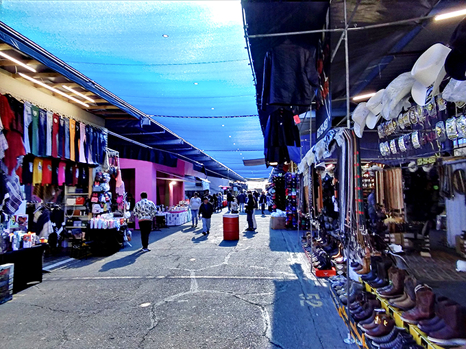 Blue tarps create a desert oasis of commerce, where shoppers hunt for treasures under Arizona's famously relentless sun.