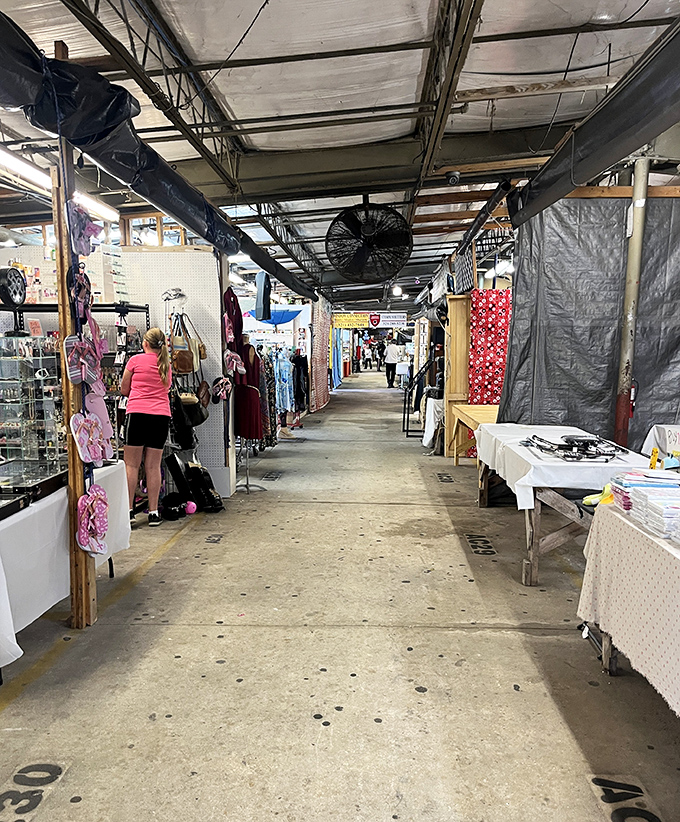 Treasure hunters navigate the covered walkways of Renninger's, where one person's castoffs become another's prized possessions. The thrill of the hunt is palpable!