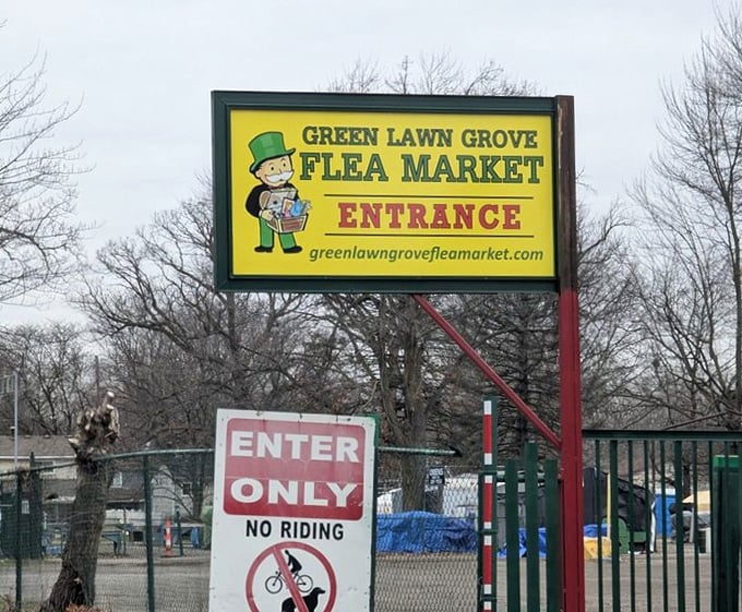 The welcoming entrance sign to Greenlawn Grove Flea Market, the first landmark for bargain seekers arriving at this Romulus treasure trove.