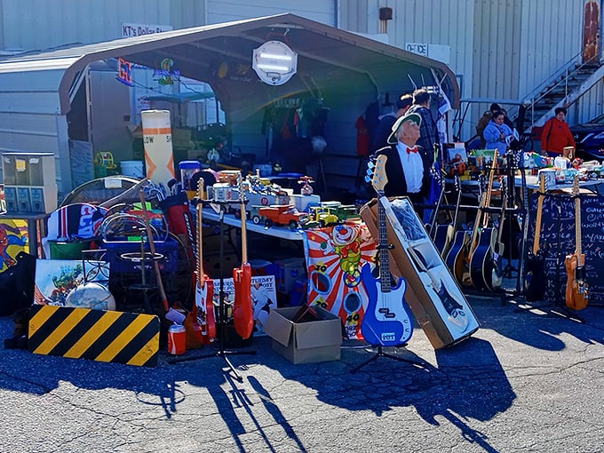 A treasure hunter's paradise unfolds under this covered stall, where guitars lean like old friends waiting to jam and colorful toys promise second chances at childhood joy.
