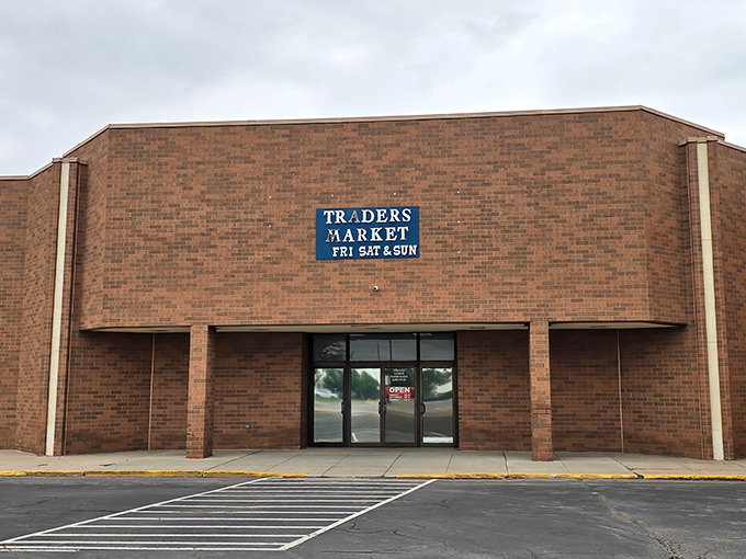 The unassuming brick exterior of Traders Market &ndash; proof that judging books by covers is humanity's greatest mistake.