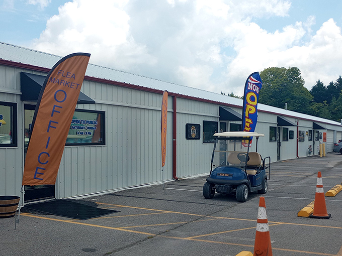 Tall orange and blue banners announce your arrival at bargain paradise. The golf cart patrol stands ready for the treasure hunt to begin!