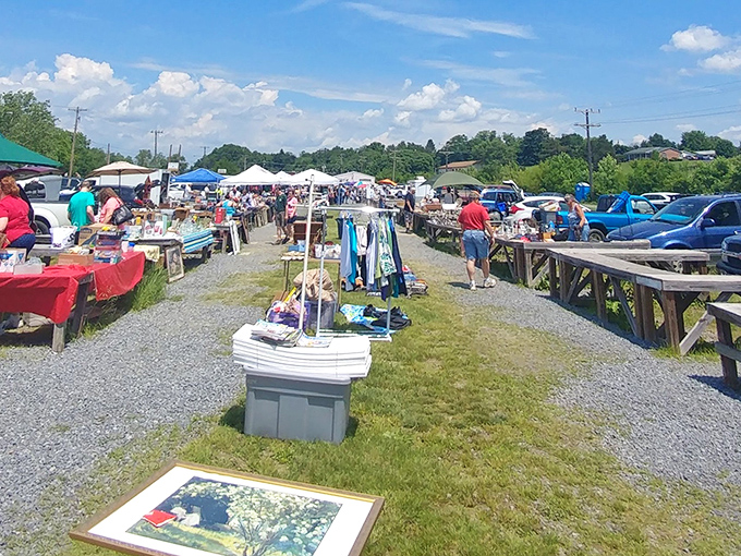 Treasure hunting begins on this gravel path lined with American flags and everyday artifacts waiting for their second chance at usefulness.