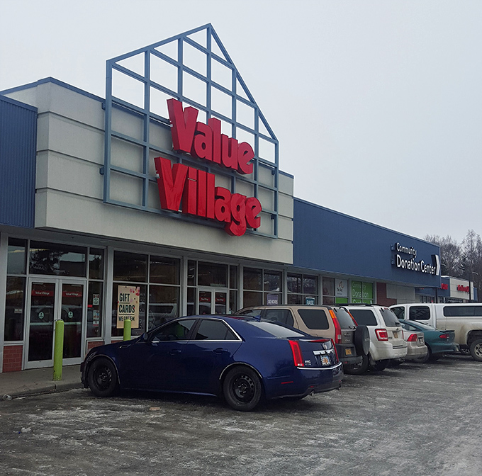 The blue-fronted fortress of frugality stands ready for bargain hunters, its triangular entrance beckoning like a North Star for the thrift-savvy Alaskan.