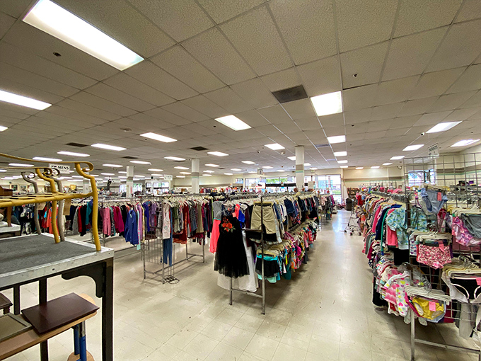 Racks upon racks of clothing stretch toward the horizon in this bargain hunter's paradise. The Narnia of secondhand shopping awaits beyond those fluorescent lights.
