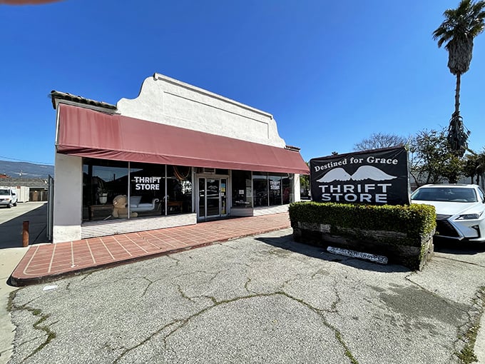 The unassuming storefront of Destined for Grace beckons with its simple red awning, like a treasure chest disguised as a mailbox.