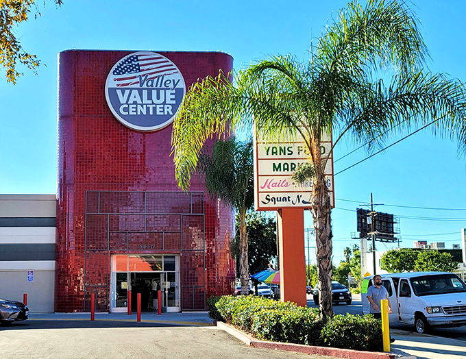 That iconic red brick facade and vintage signage practically scream "your wallet's about to get very happy."