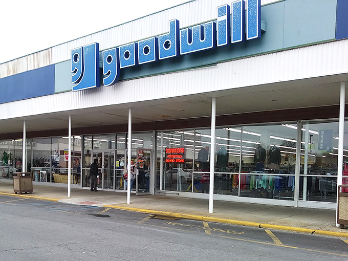 The iconic blue Goodwill sign beckons like a thrifting lighthouse on Kirkwood Highway, promising treasure hunts that won't break the bank.